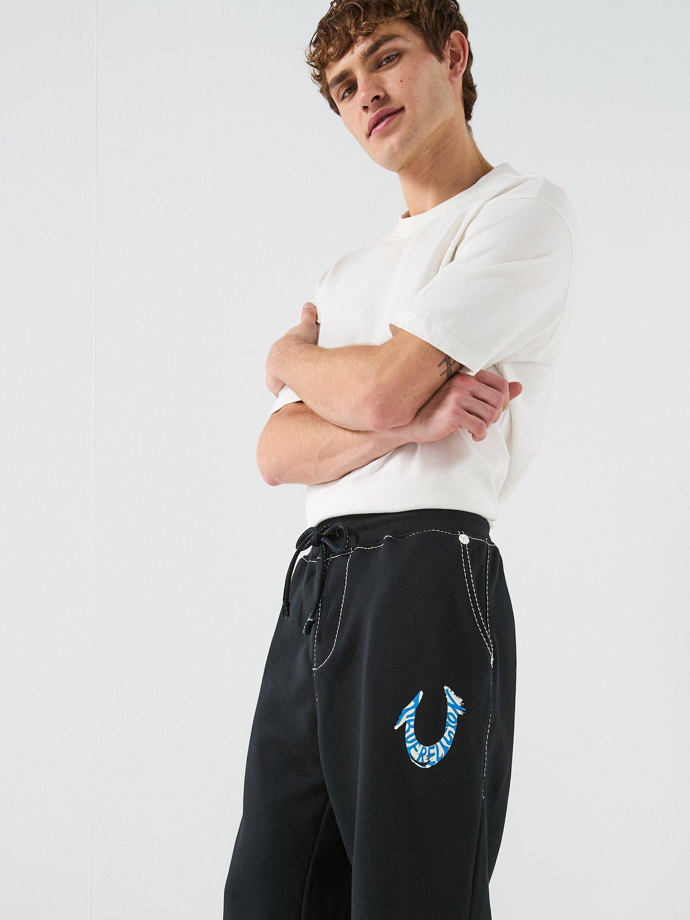 TRUE RELIGION Paint Patch Baggy Joggers - Black | Littlewoods